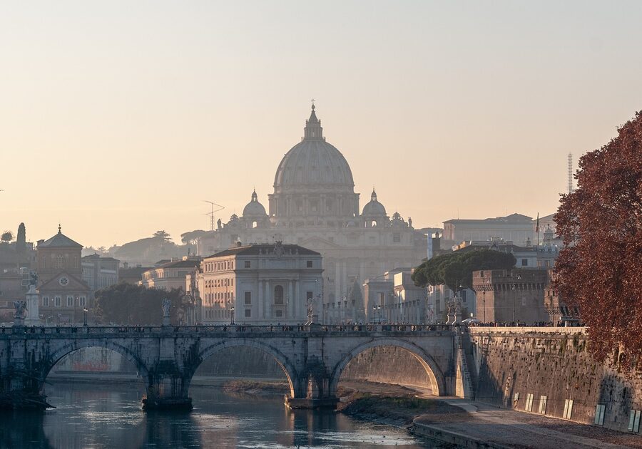 Rome sunset with bridge and dome skyline
