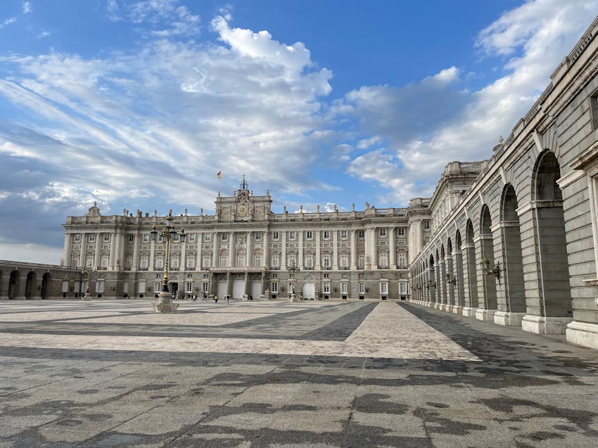 Royal Palace of Madrid under a vivid blue sky