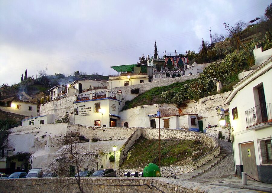 Whitewashed cave houses on the Sacromonte hillside in Granada