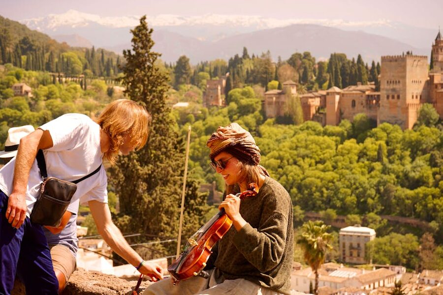 Street musicians playing in front of the Alhambra in Granada