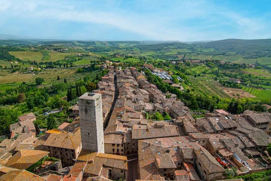 Aerial of San Gimignano towers and terracotta rooftops