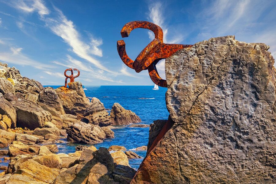 Comb of the Winds Chillida sculpture on the rocks at Ondarreta