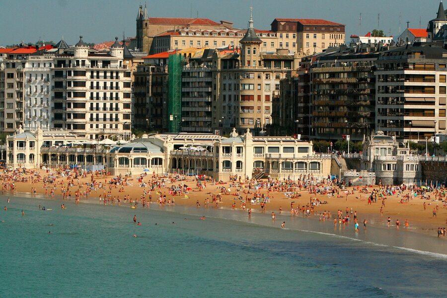 Swimmers and sunbathers at La Concha bay in San Sebastián