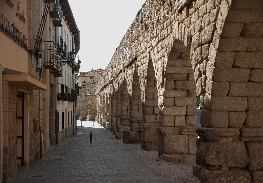 Segovia aqueduct stone arches with the city behind