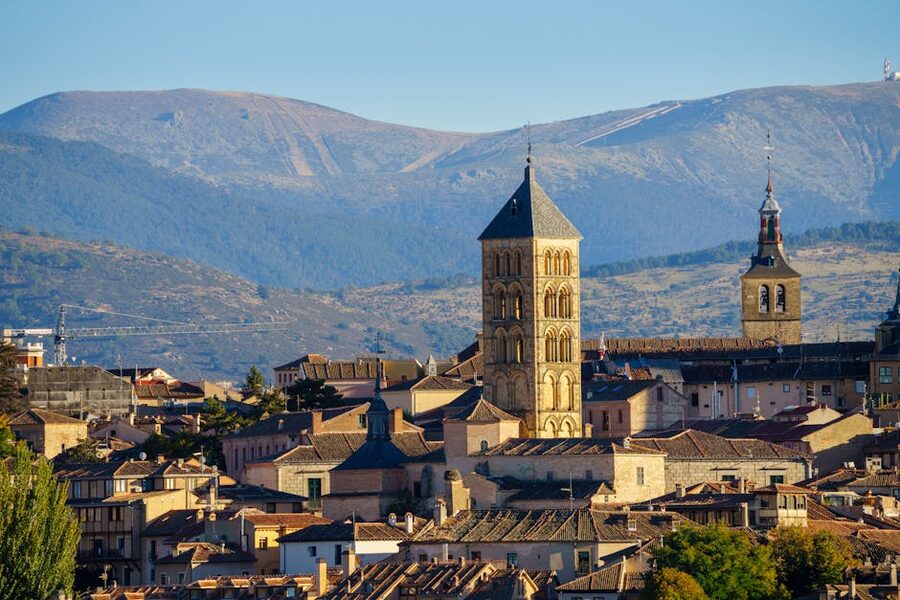 Segovia old town with Sierra de Guadarrama mountains