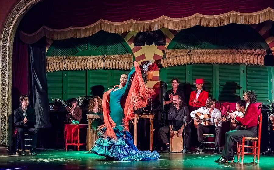 Flamenco performance on stage at Palacio Andaluz Sevilla