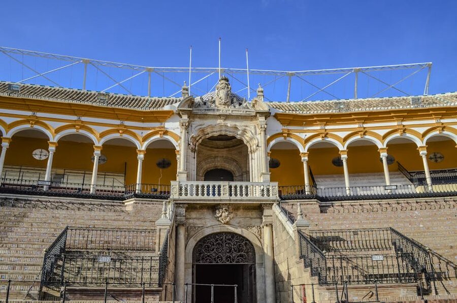 Plaza de Toros Seville historic bullring exterior in sunlight