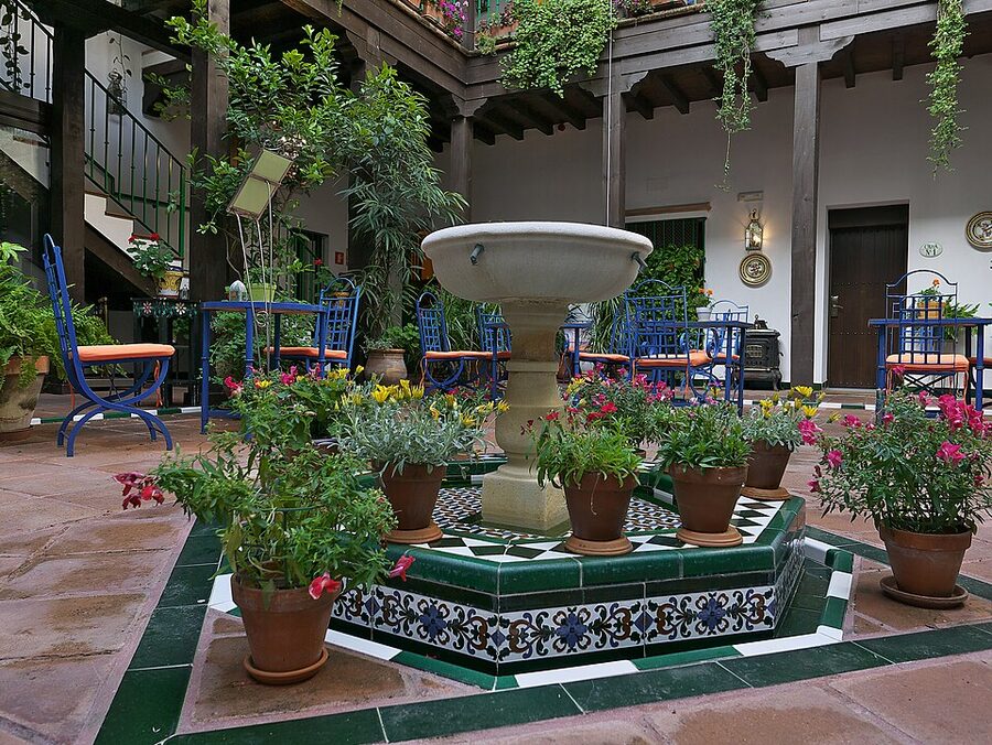 Santa Cruz Sevilla patio with traditional Andalusian tilework