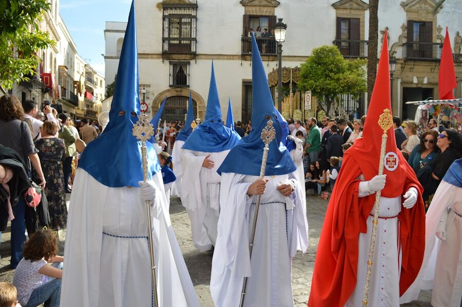 Semana Santa Holy Week procession in Seville with hooded penitents