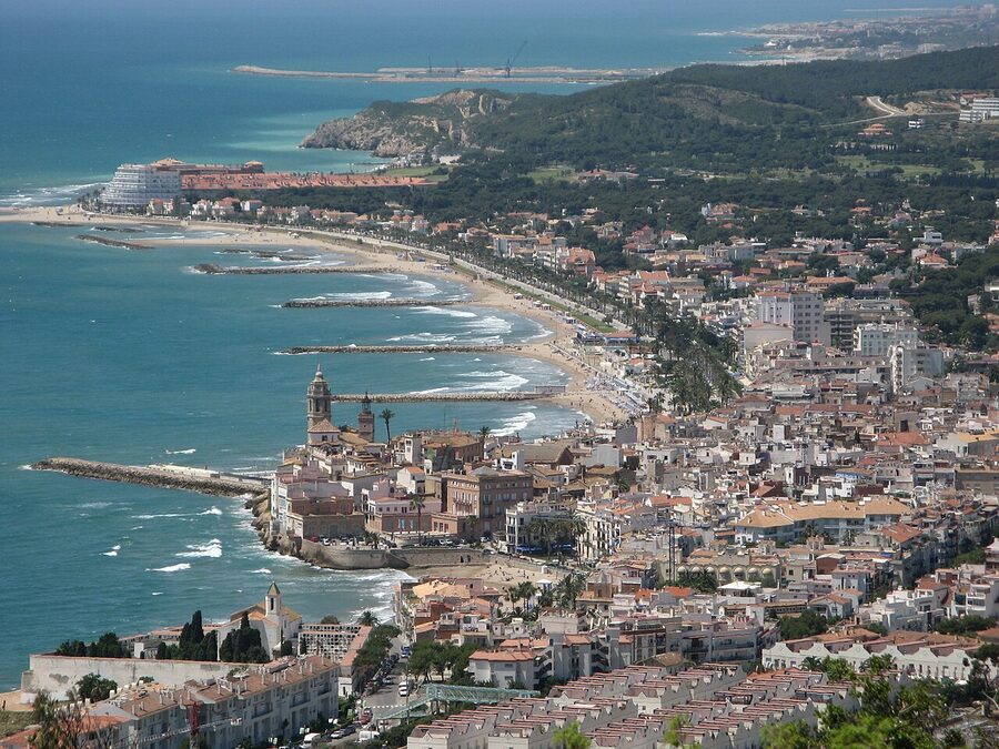 Sitges old town rooftops with church and sea behind