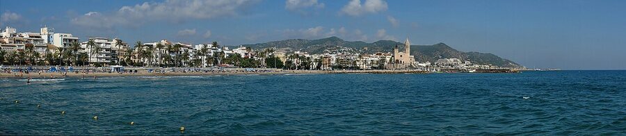 Panorama of Sitges historic centre seen from the breakwater