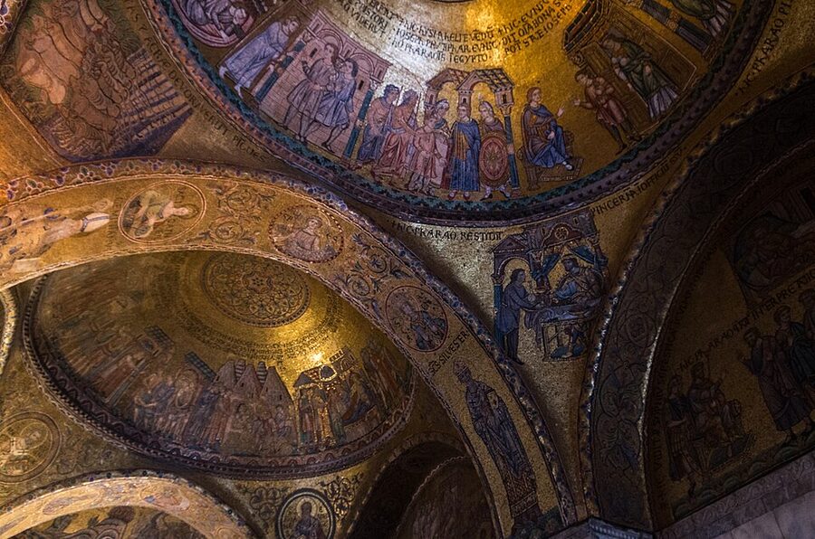 St Marks Basilica front view with tourists Venice
