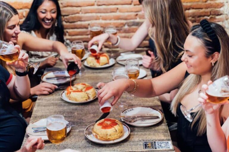 Tapas, Wine & Culture: Madrid Private Food Tour Experience - Exploring Madrid’s Historic Heart: Sol and La Latina