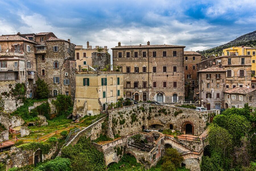 Historic buildings in Tivoli Italy under cloudy sky