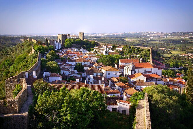 Transfer Tour Lisbon/Porto with 2 stops options Óbidos, Nazaré, Fátima, Coimbra - Why This Tour Offers Great Value