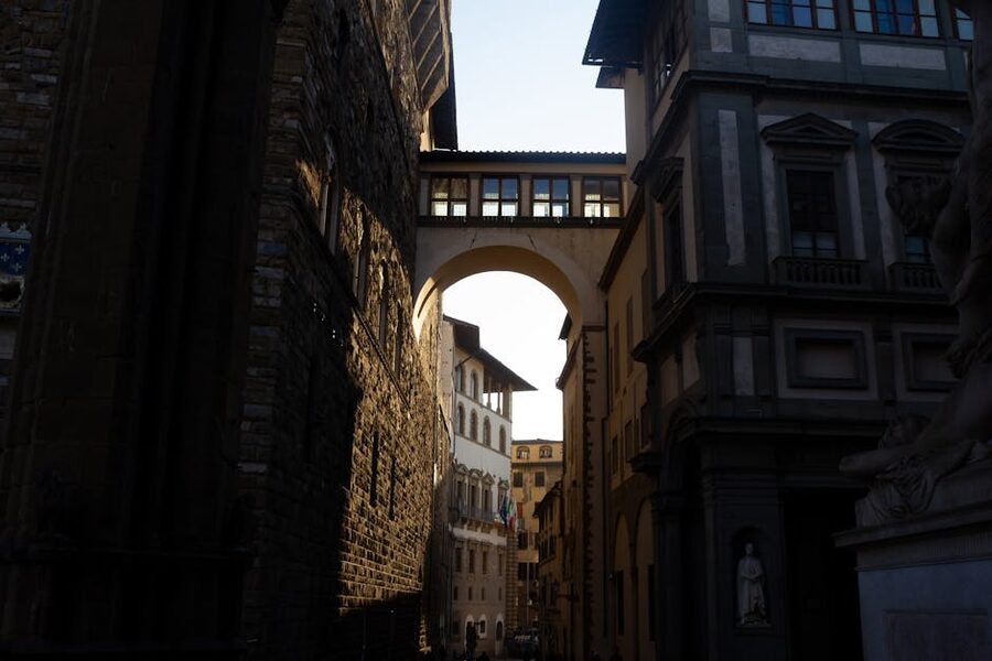 Archway view inside the Uffizi Gallery courtyard in Florence