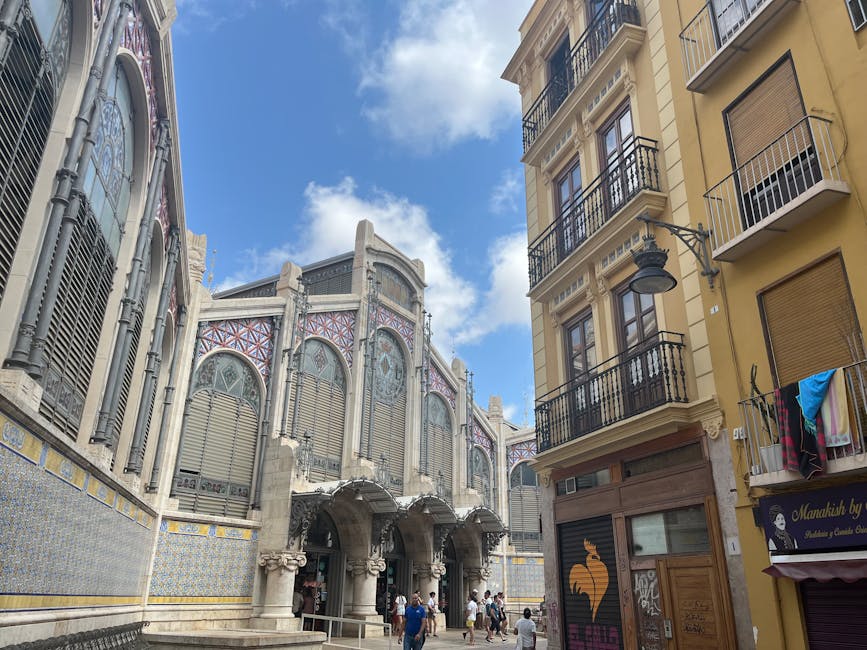 Mercado Central Valencia exterior with people walking