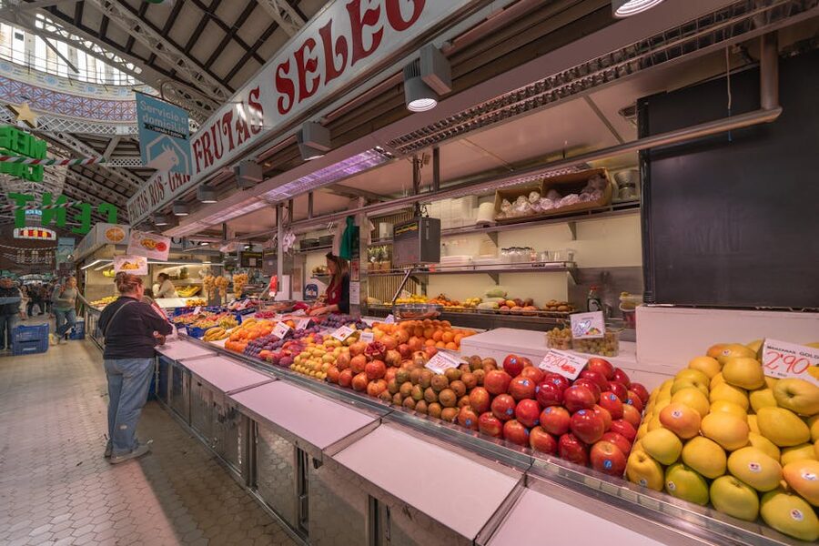 Fresh produce stalls inside Valencia Central Market