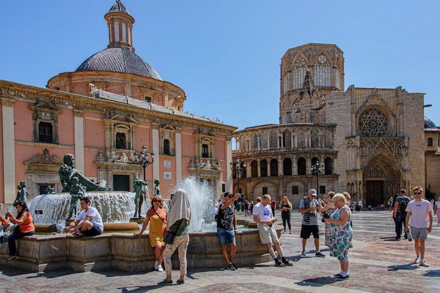 Plaza de la Virgen with Valencia Cathedral and tourists