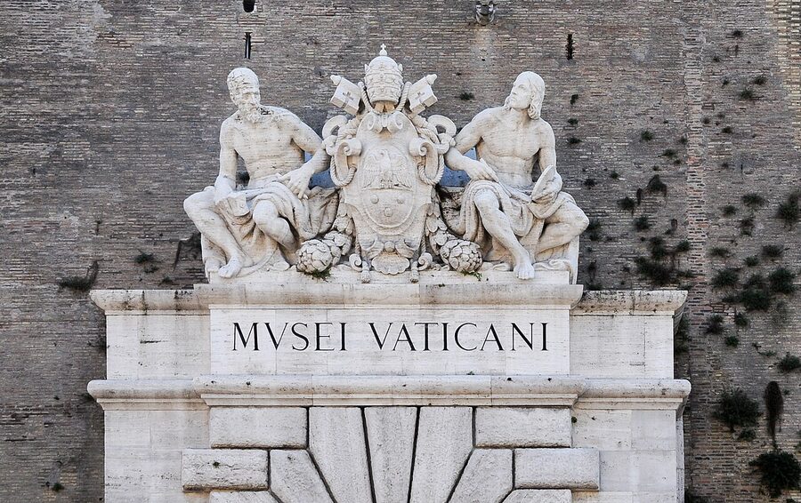 The Vatican Museums entrance on Viale Vaticano with security and visitors