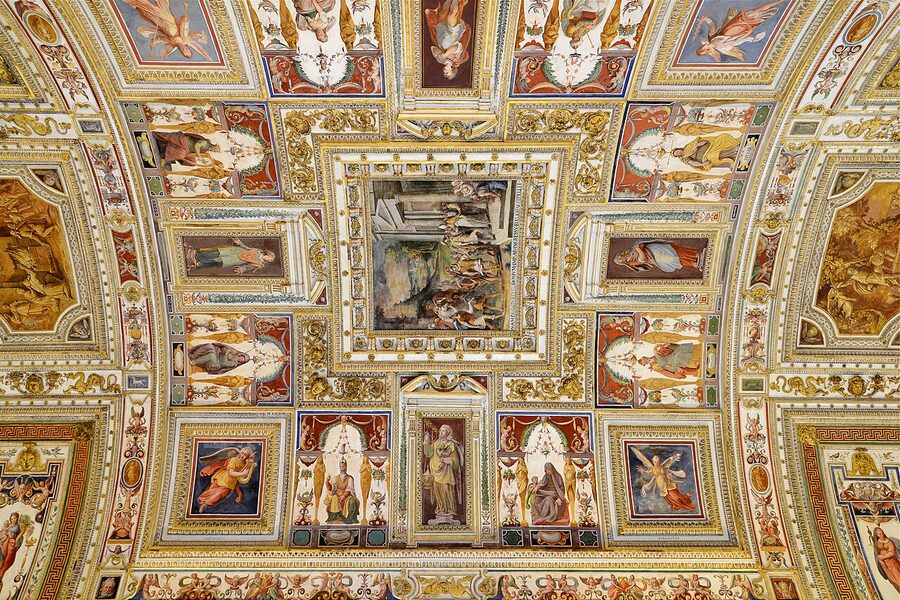 The Gallery of Maps at the Vatican Museums showing 16th century painted maps and gilded ceiling