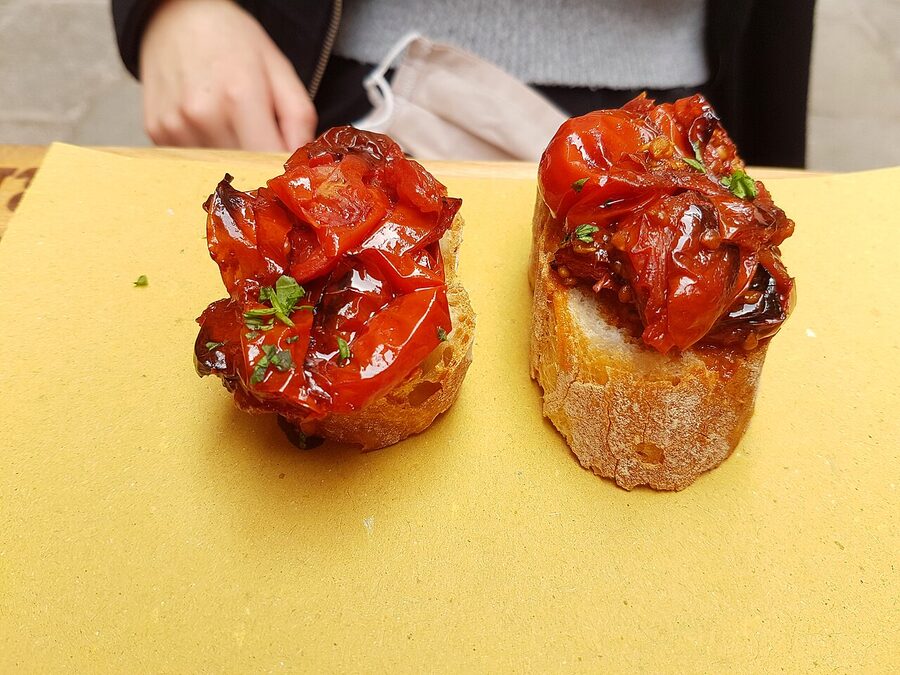 Cicchetti topped with mortadella in Venice