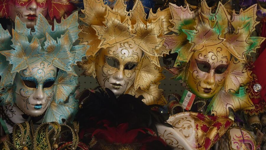 Venetian carnival masks displayed on a stall