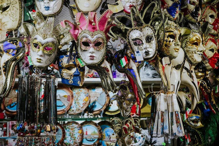 Venetian carnival masks displayed in a Venice shop window