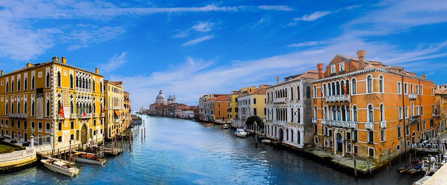 A small canal in old-town Venice with traditional architecture