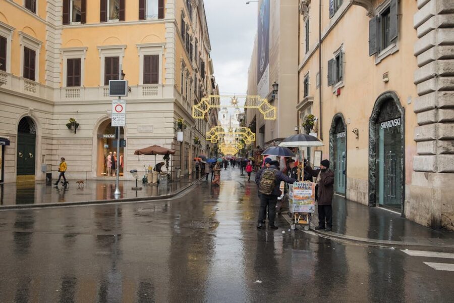 Via del Corso shopping street on a rainy day Rome