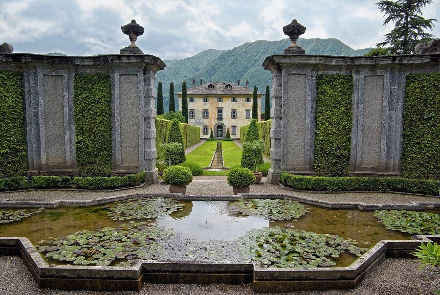 Villa Balbiano fountain and garden with cypress trees on Lake Como