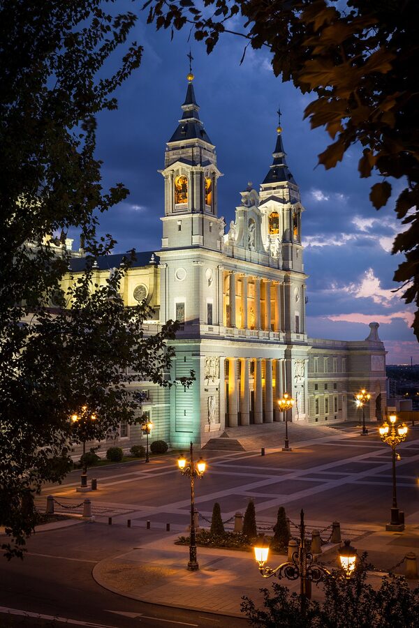 Almudena Cathedral facade at dusk in Madrid