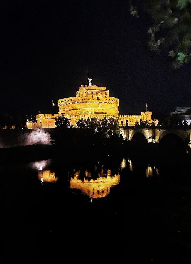 Castel Sant'Angelo at night reflected in the Tiber